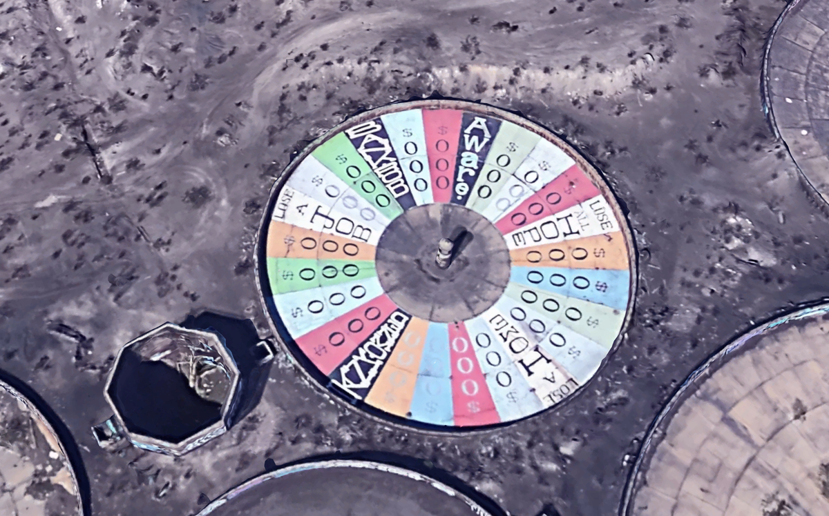 there is a giant fake Wheel of Fortune wheel in the Nevada desert ...