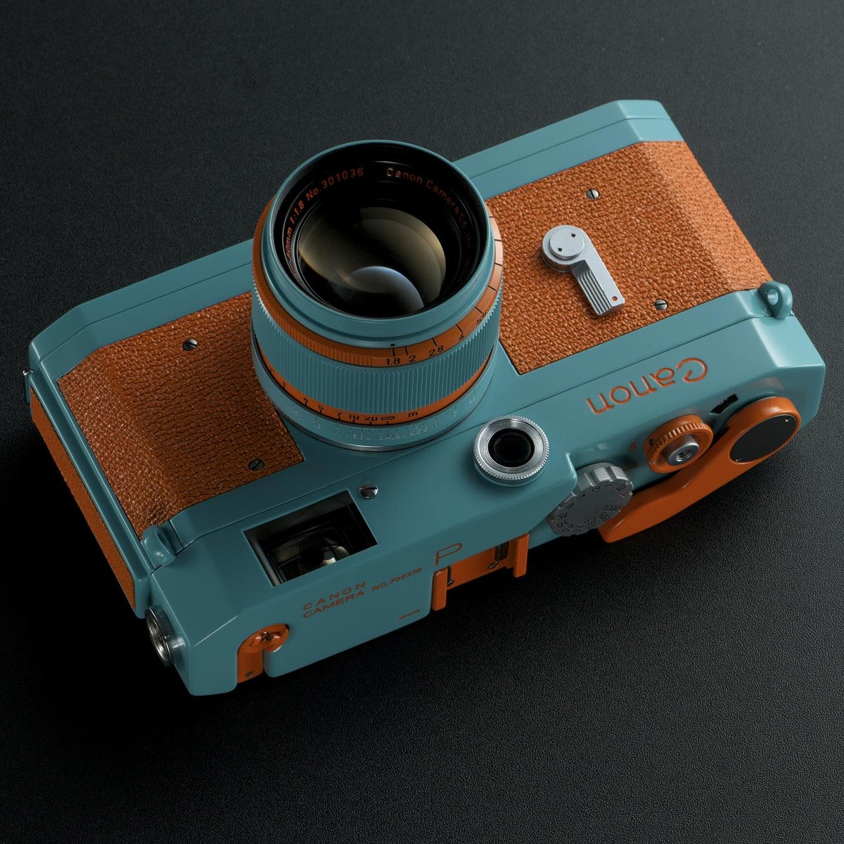 custom orange and blue canon P by shueido camera | MLTSHP