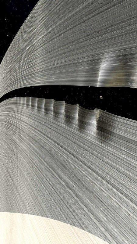 Daphnis making waves in the rings (render) | MLTSHP